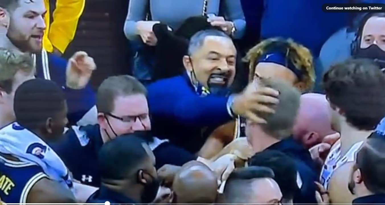 Juwan Howard with an Open-Handed Punch/Slap - Crossing Broad